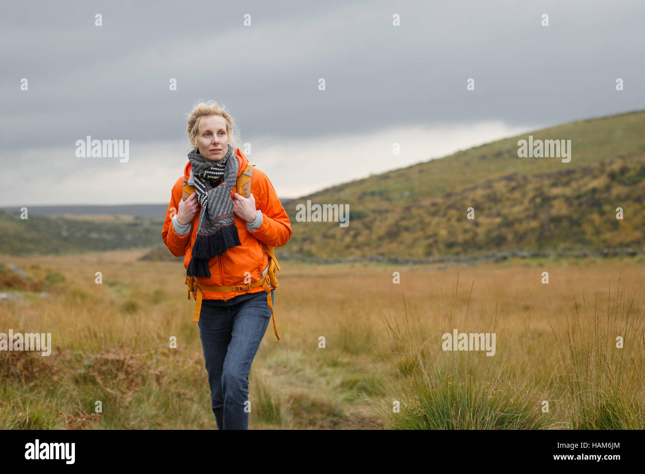 A woman hiking in the countryside Stock Photo - Alamy