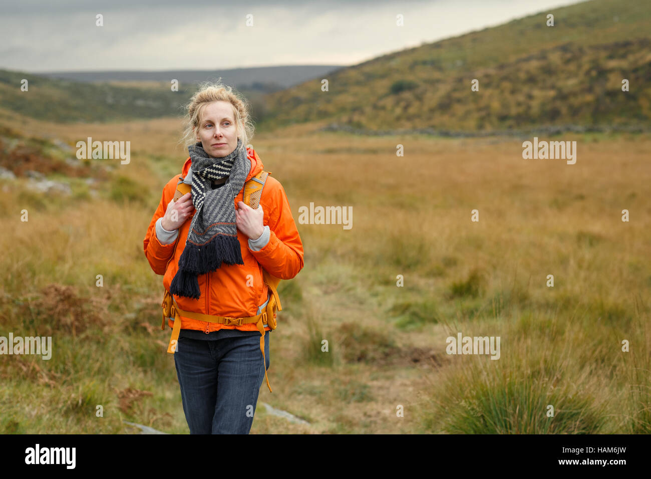 A woman hiking in the countryside Stock Photo - Alamy