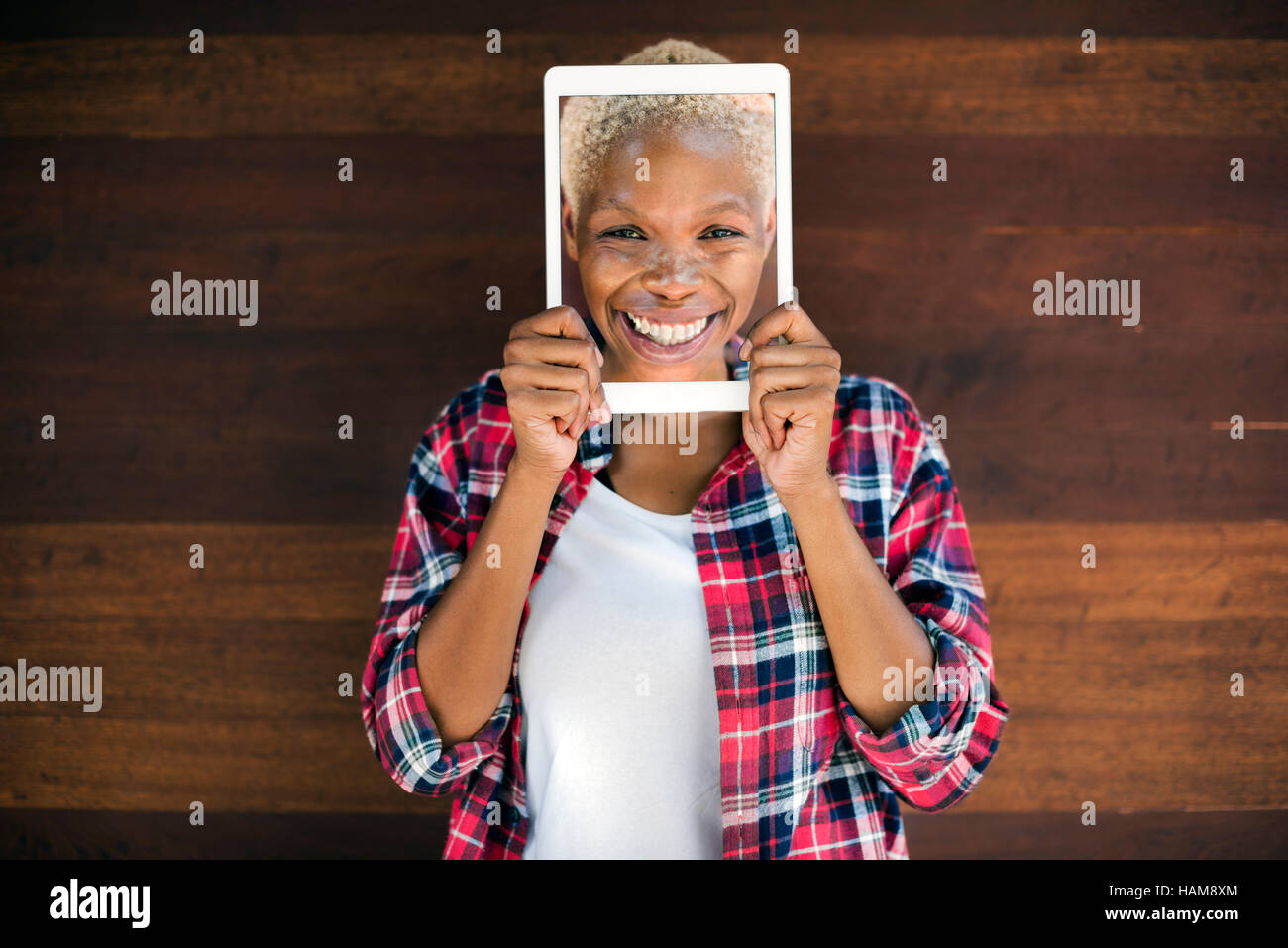 African Woman Digital Tablet Face Covered Smiling Technology Concept ...
