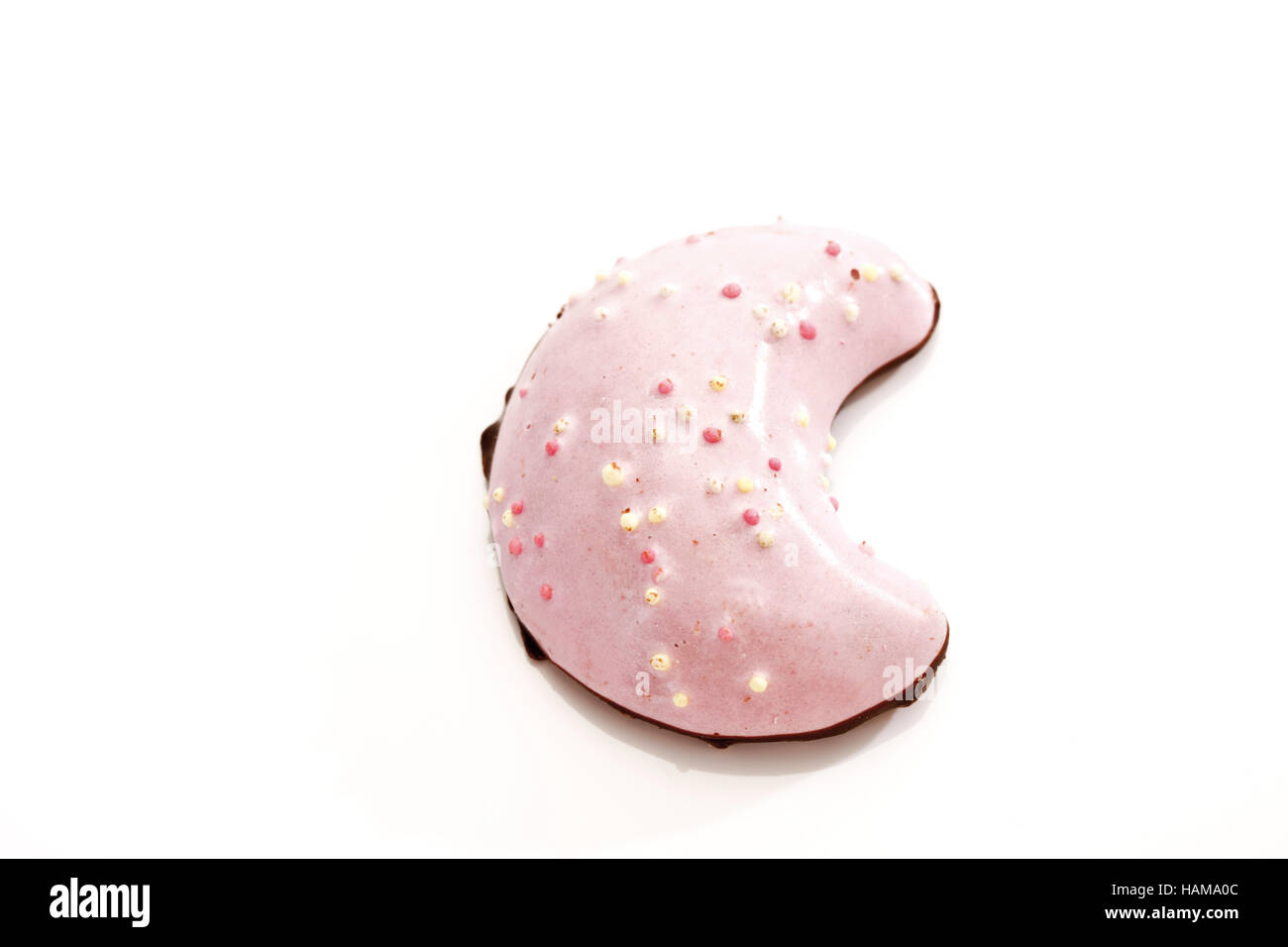 Sugar glazed gingerbread crescent moon biscuit with sugar pearls Stock ...