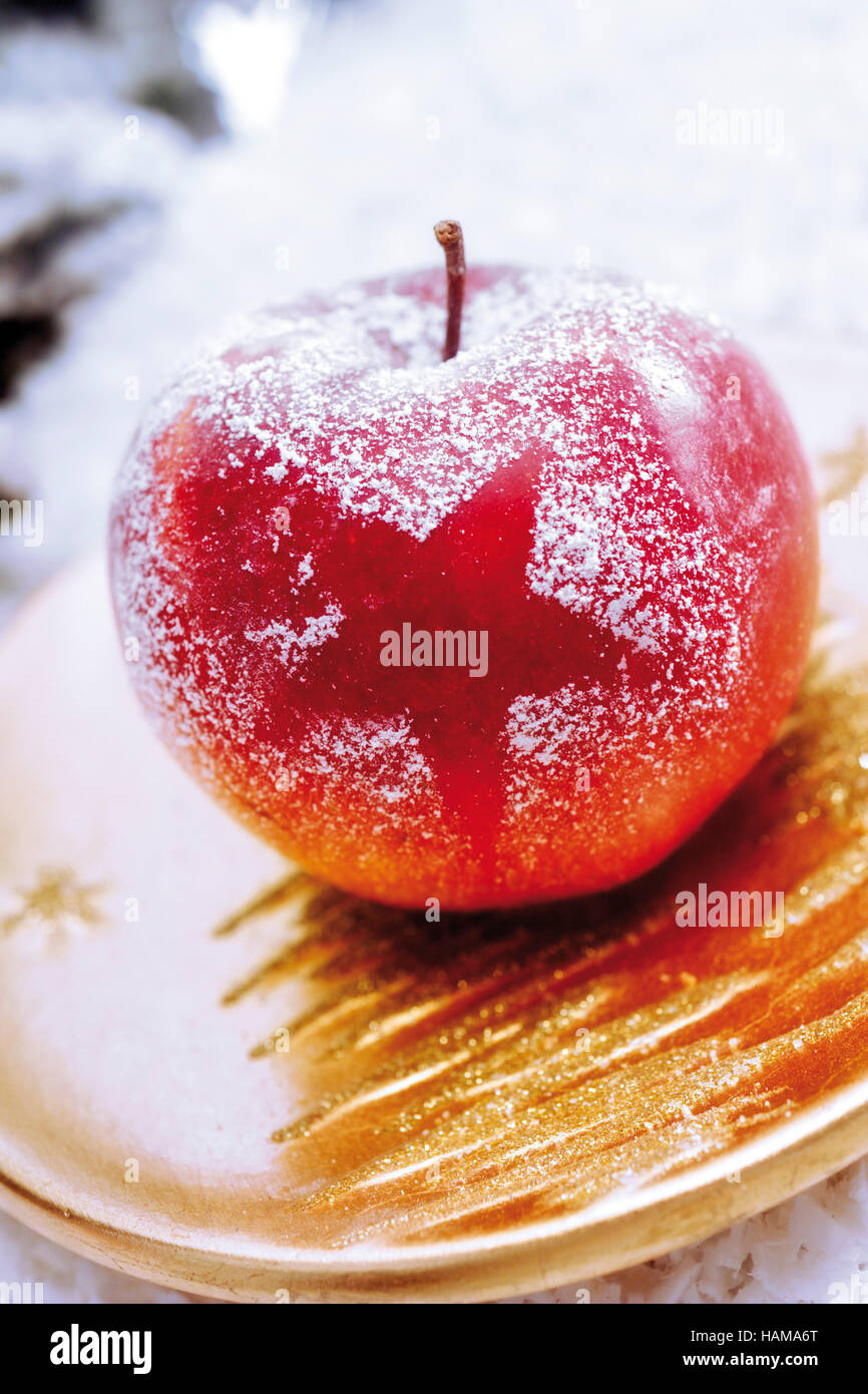 Apple coated with powder sugar Stock Photo - Alamy