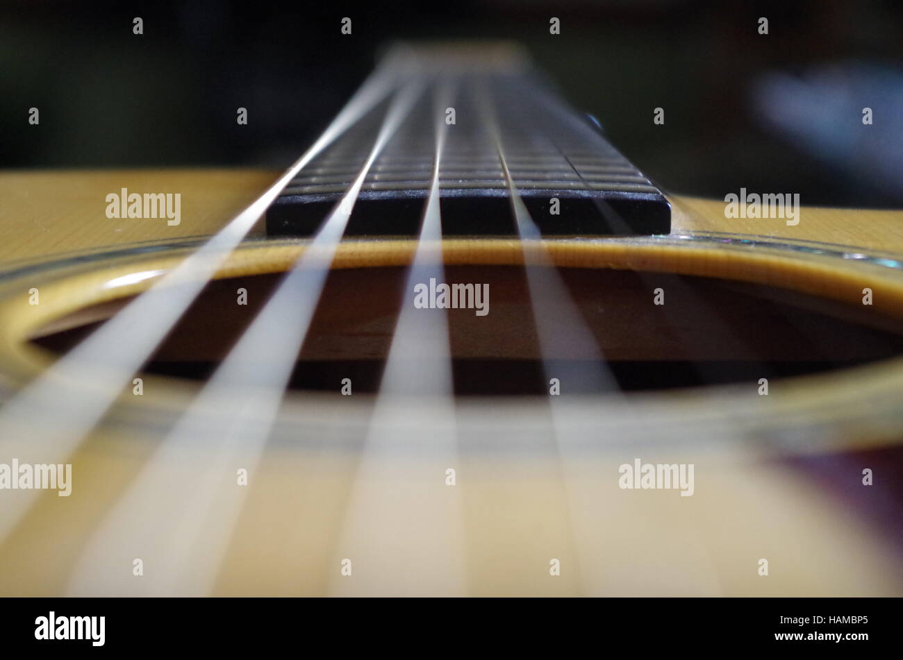 Up close acoustic guitar Stock Photo - Alamy