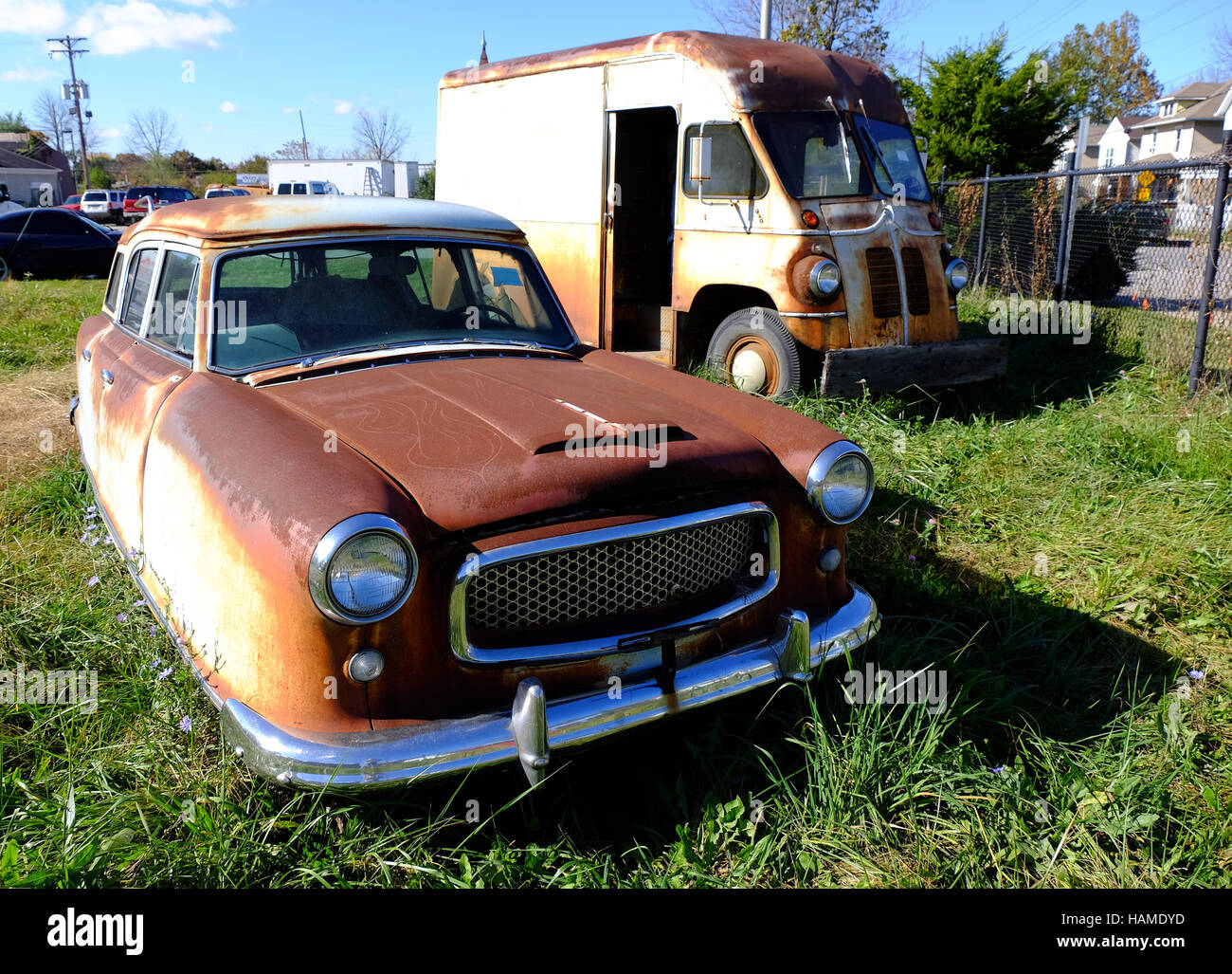 A Nash wagon and a Chevy chassis delivery truck in a salvage yard ...