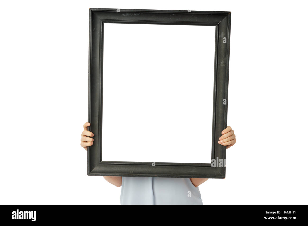 Woman hands holds black empty frame Stock Photo - Alamy