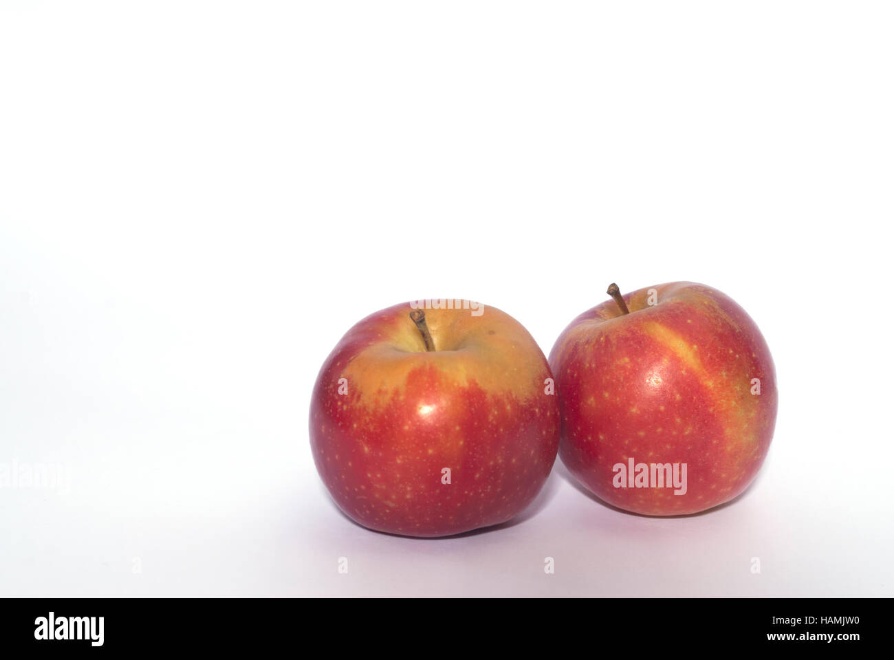 Two red apples hi-res stock photography and images - Alamy