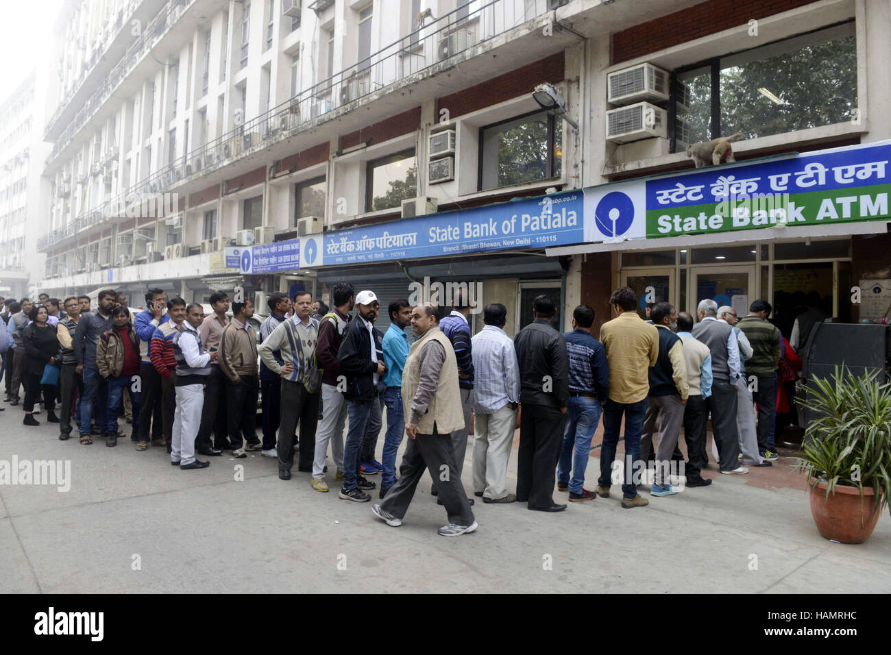 Indian bank queue hi-res stock photography and images - Alamy