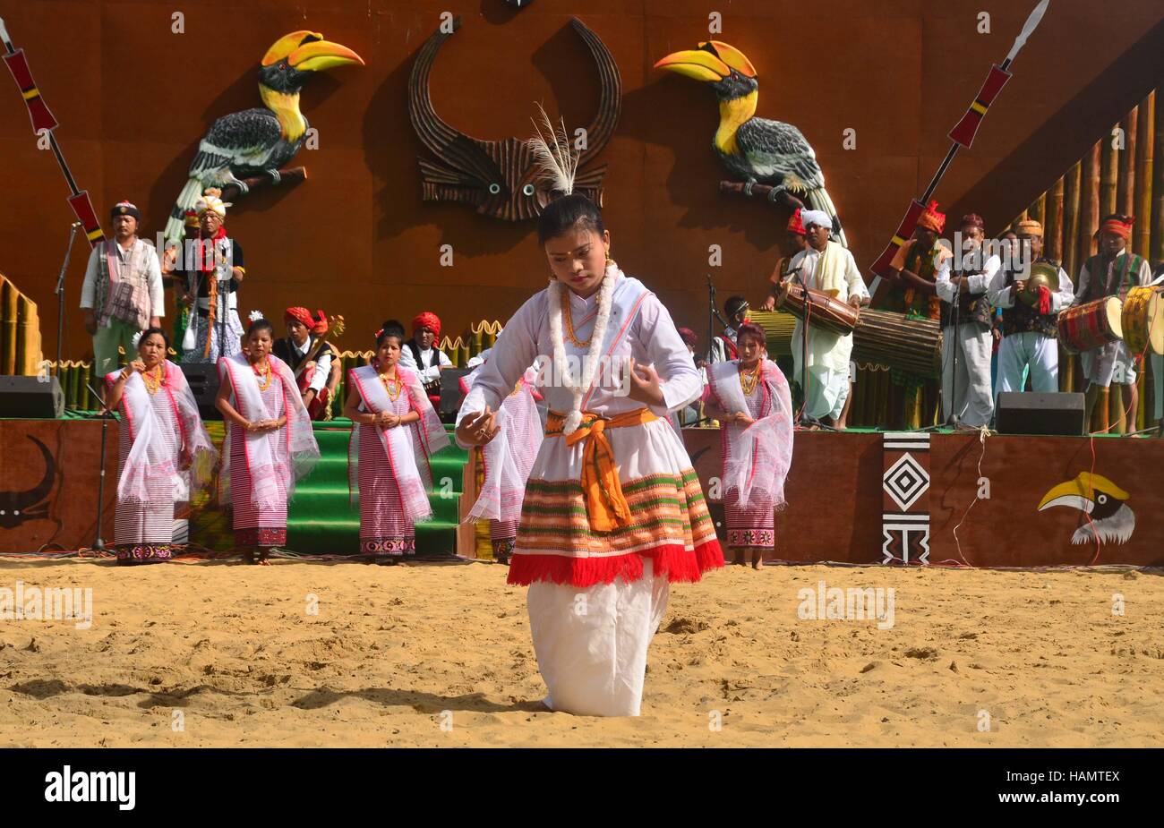 Kisama, India. 02nd Dec, 2016. Artist from Manipur state perform a ...
