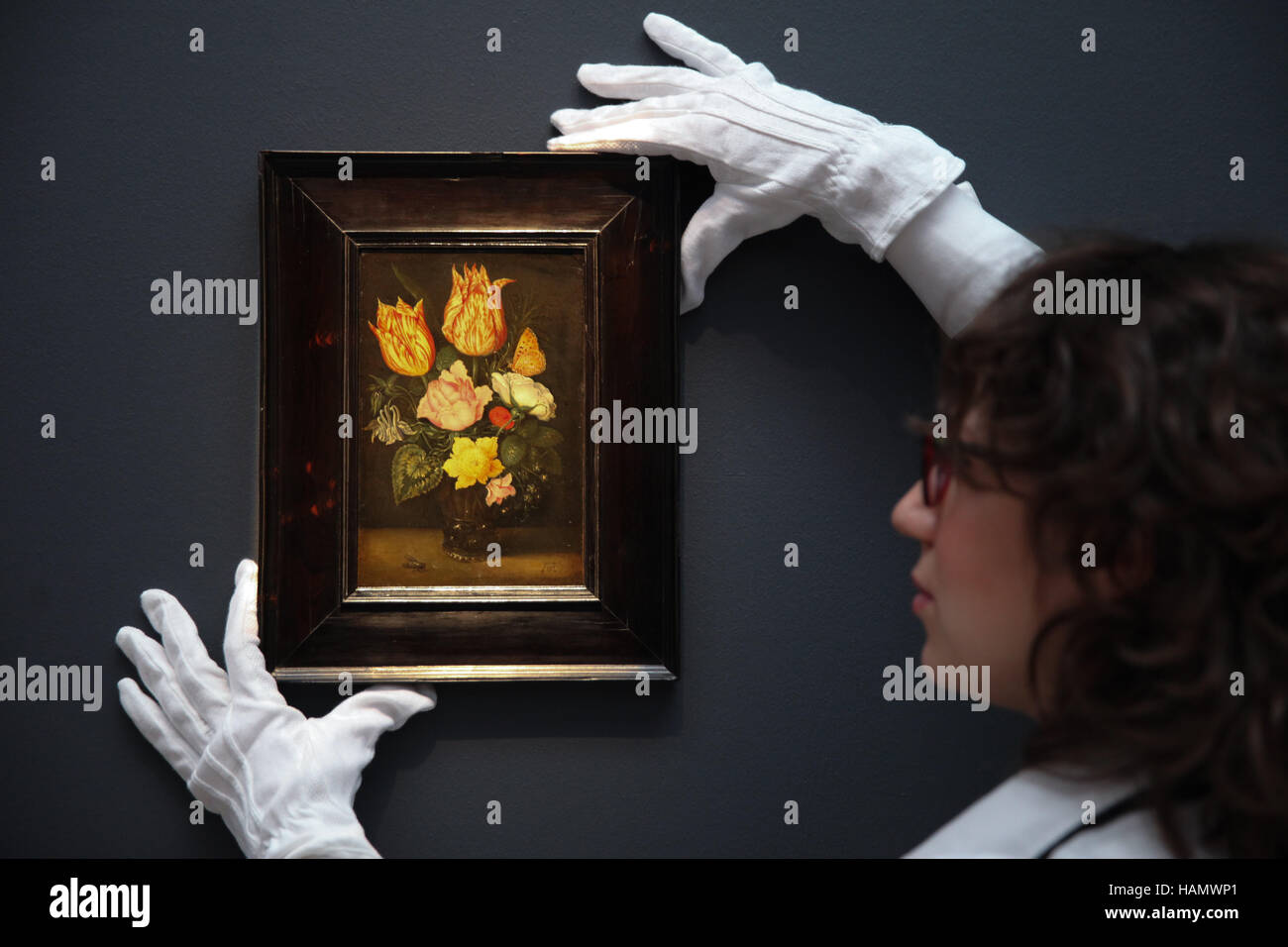 London, UK 2 Dec 2016 - Technicians hang a Dutch and Flemish ...