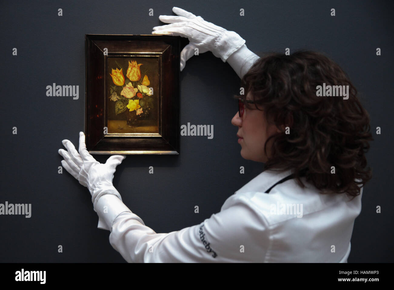 London, UK 2 Dec 2016 - Technicians hang a Dutch and Flemish ...