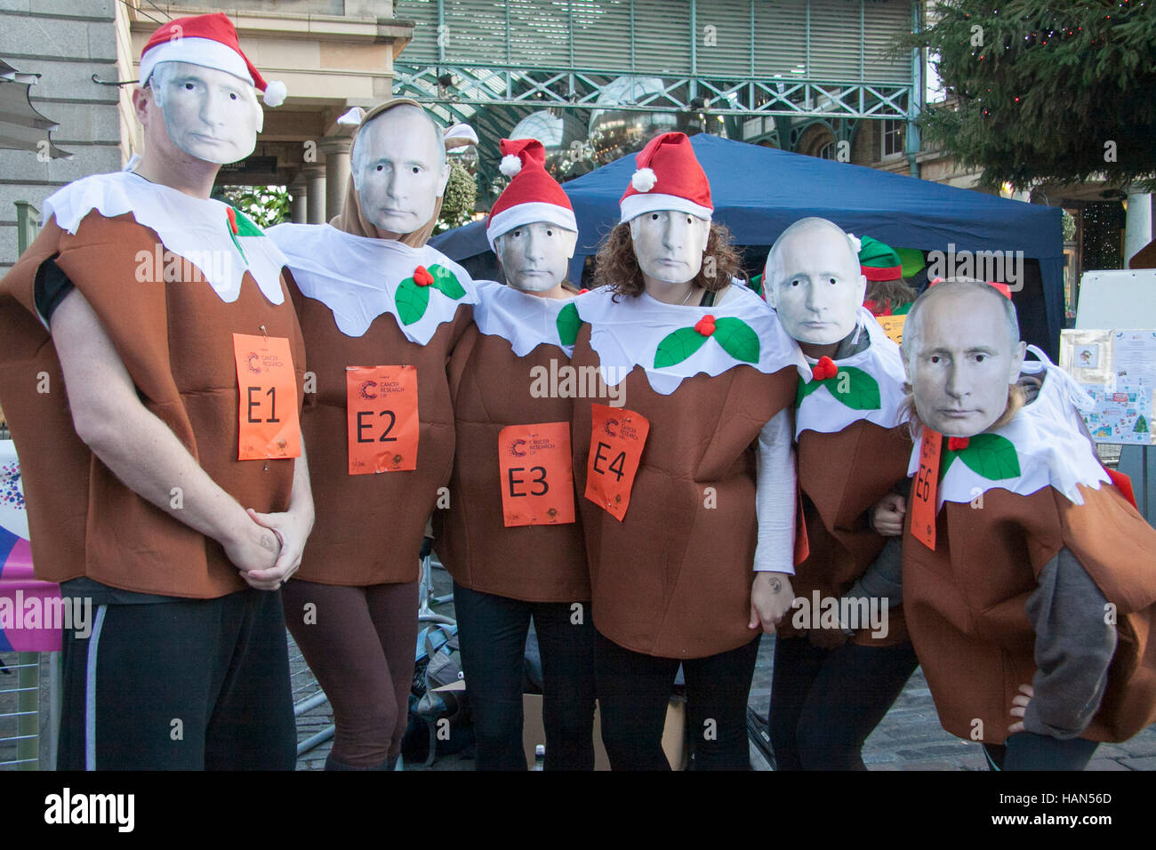 London, UK. 3rd Dec, 2016. Participants wearing Vladimir Putin masks ...
