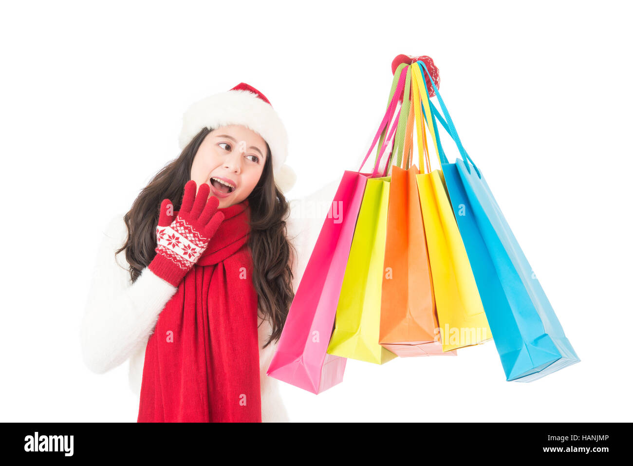 Happy excited female shopper showing purchases excited and joyful with ...