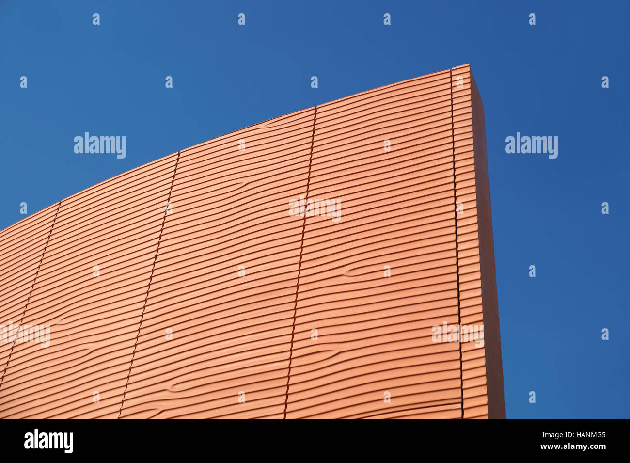 Modern urban architecture, Abstract wave facade Stock Photo - Alamy