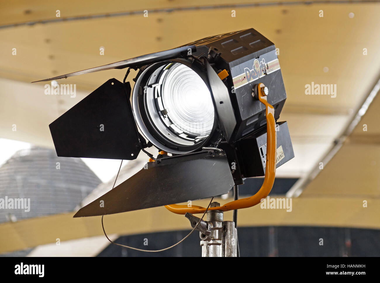 theater spot light in activity against grunge wall Stock Photo - Alamy