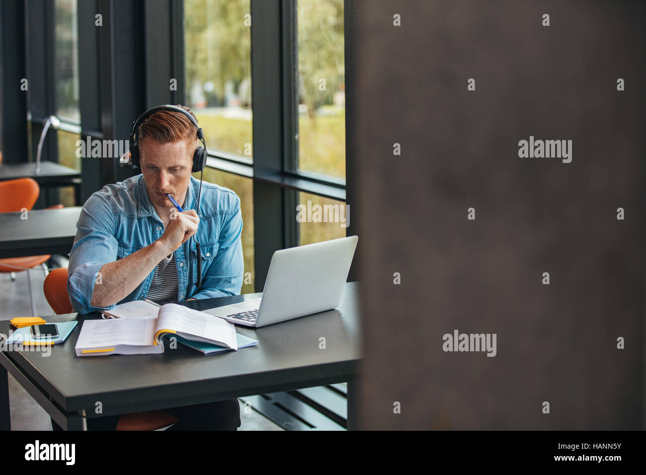 Male thinking student hi-res stock photography and images - Alamy