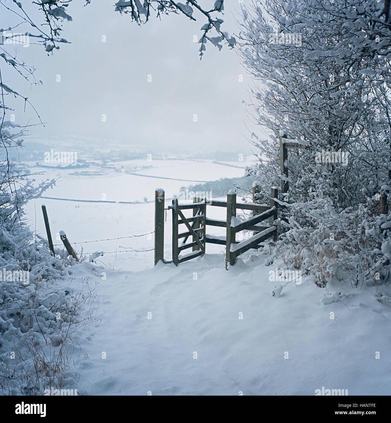 Snowy scene, Kissing Gate on the North Downs way Kent, England Stock ...