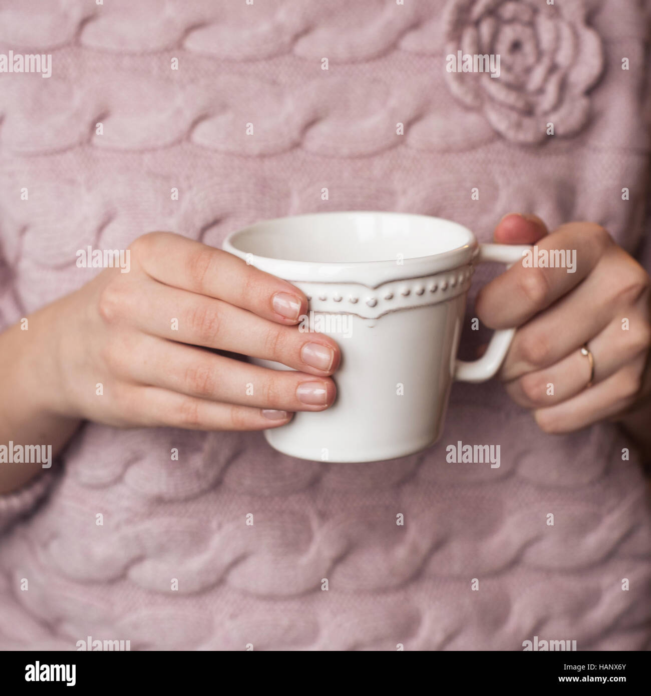 beautiful woman's hands with a cup Stock Photo - Alamy