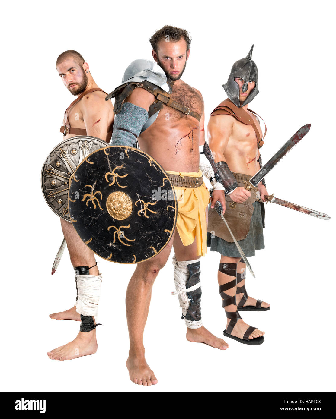 Gladiators posing isolated in a white background Stock Photo - Alamy