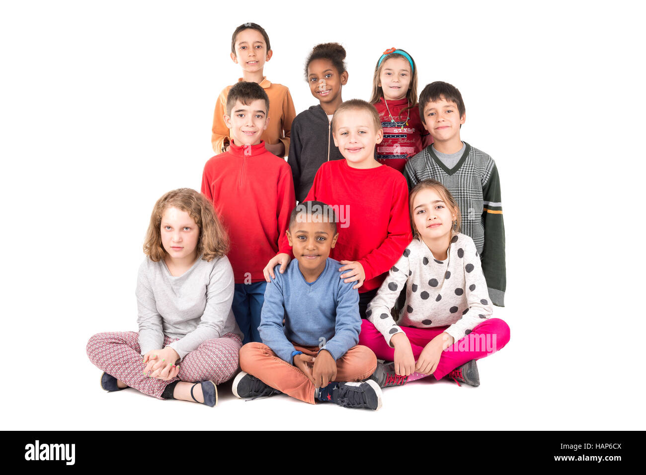 Group of happy children posing isolated in white Stock Photo - Alamy
