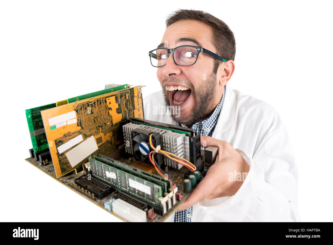 Nerd engineer posing with computer components isolated in a white ...