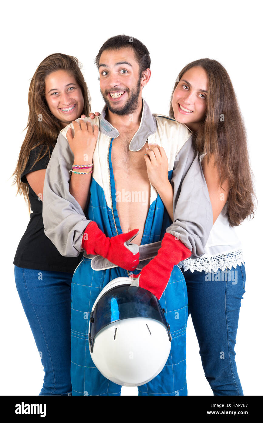 Racing driver posing with girls isolated in white Stock Photo - Alamy
