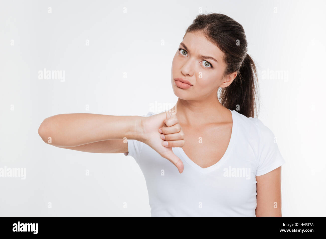 Model showing finger down in studio. isolated white background Stock ...