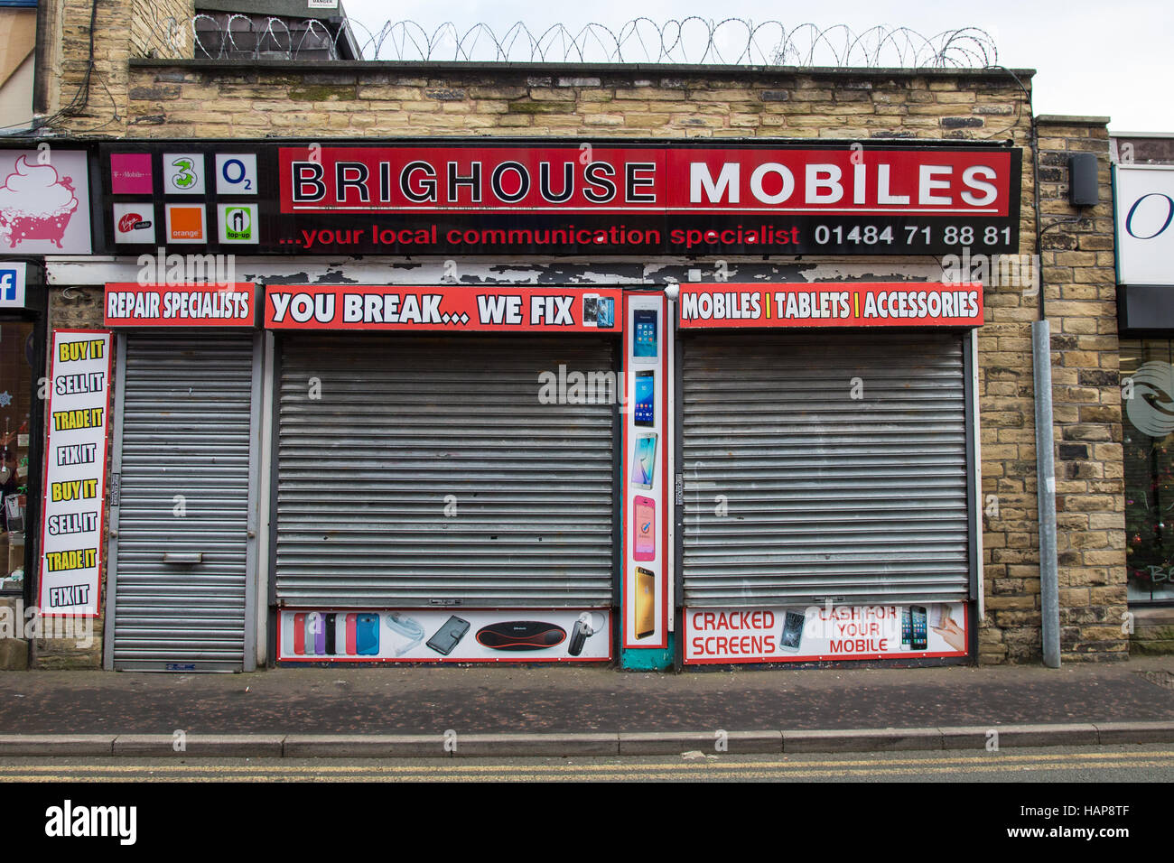 Closed mobile phone shop Brighouse, Calderdale, West Yorkshire Stock ...