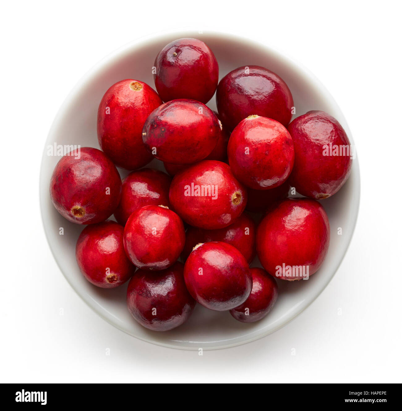 Bowl of cranberries isolated on white background, top view Stock Photo ...