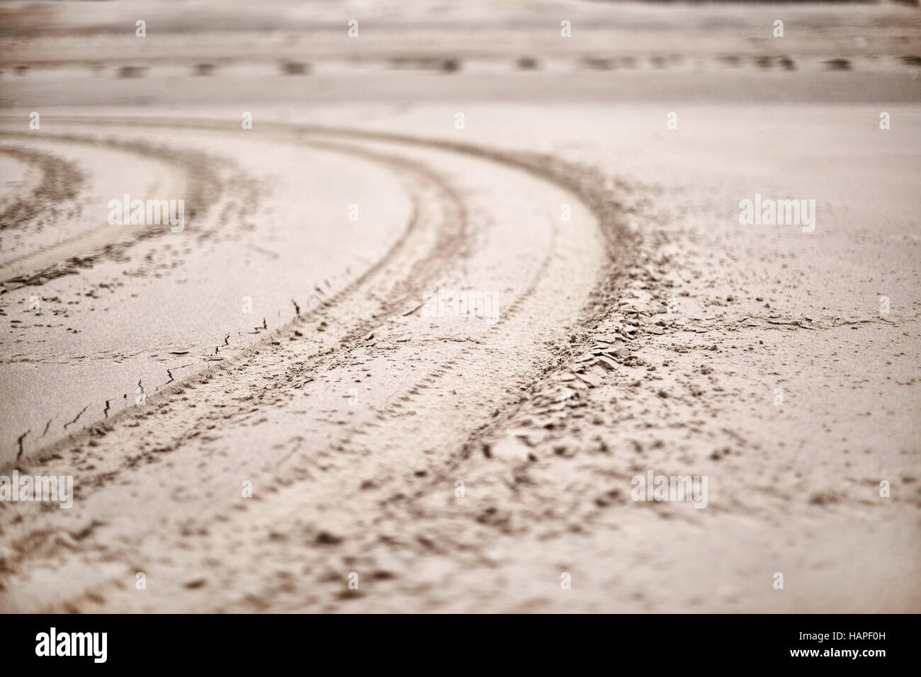 Tracks forming in sand on beach Stock Photo - Alamy