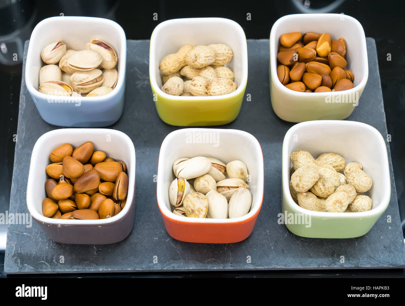 Variety nuts and raisins from above on the table Stock Photo - Alamy