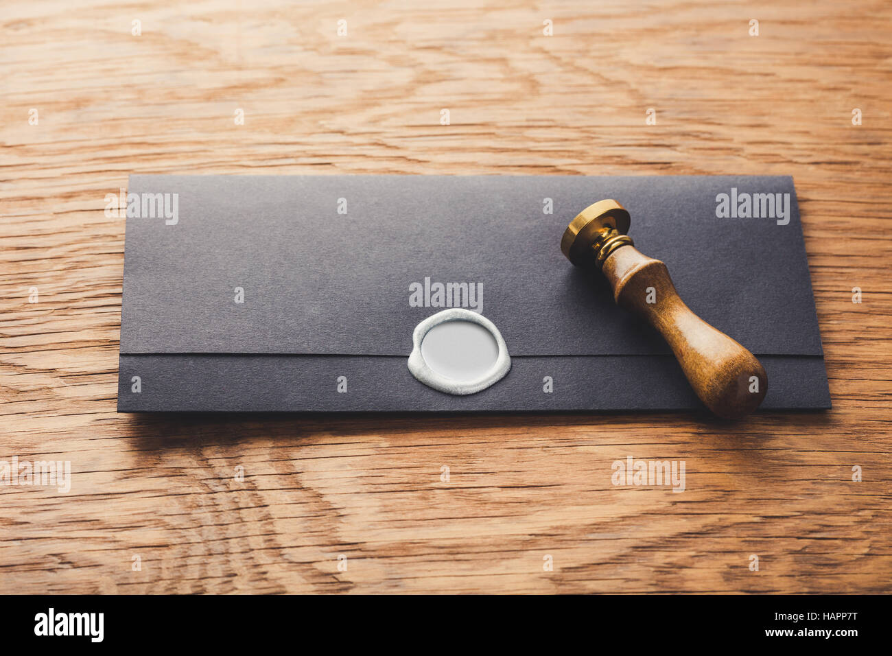 envelope with a stamp on the wooden background Stock Photo - Alamy