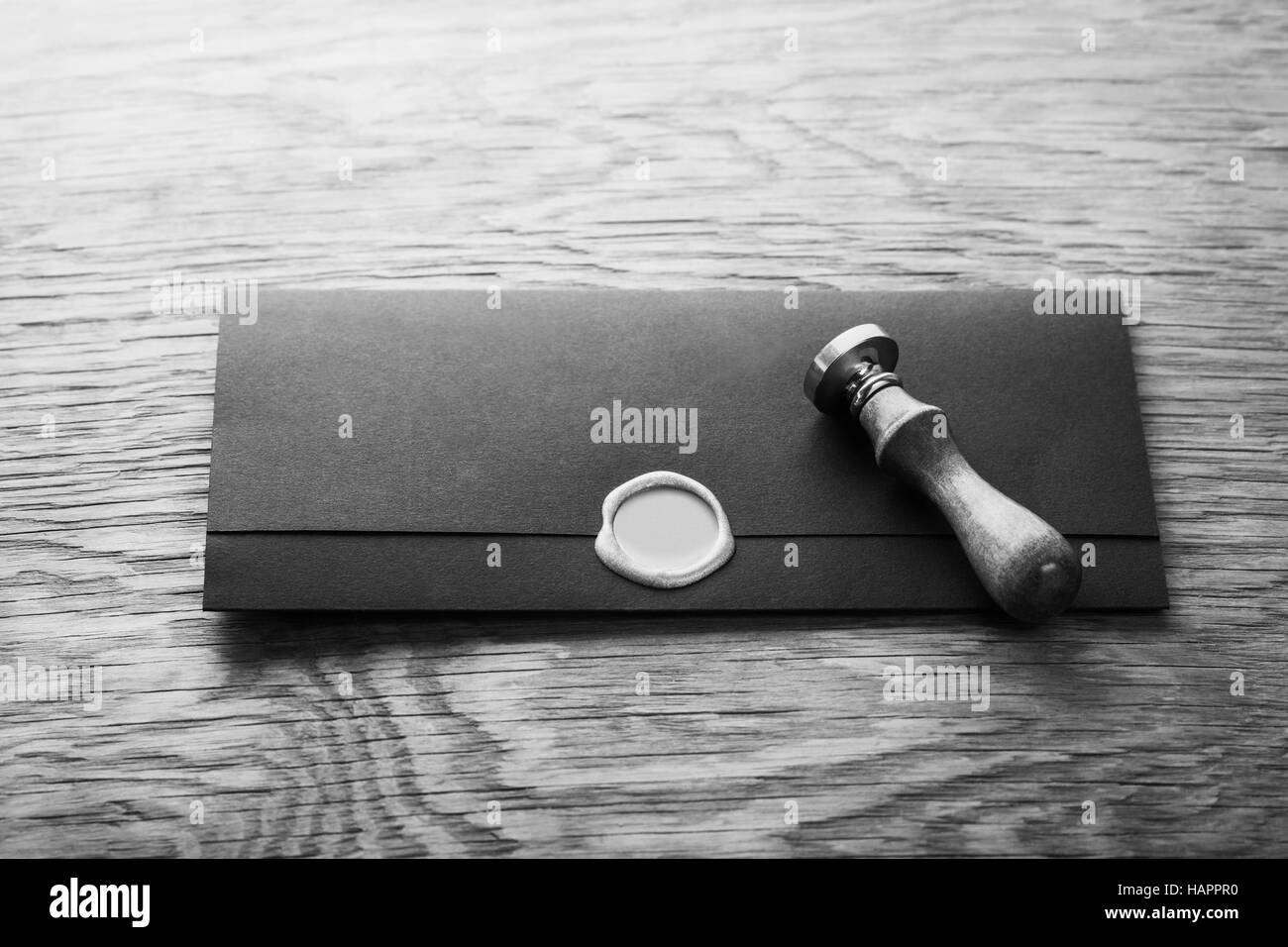 envelope with a stamp on the wooden background Stock Photo - Alamy