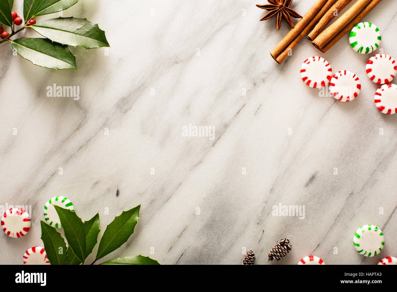 Holiday background with peppermint candy Stock Photo - Alamy