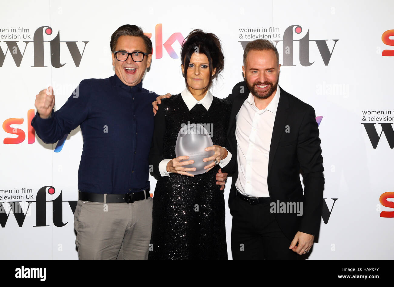 Stephen Webb (left) and Chris Steed presented Tania Alexander with the ...