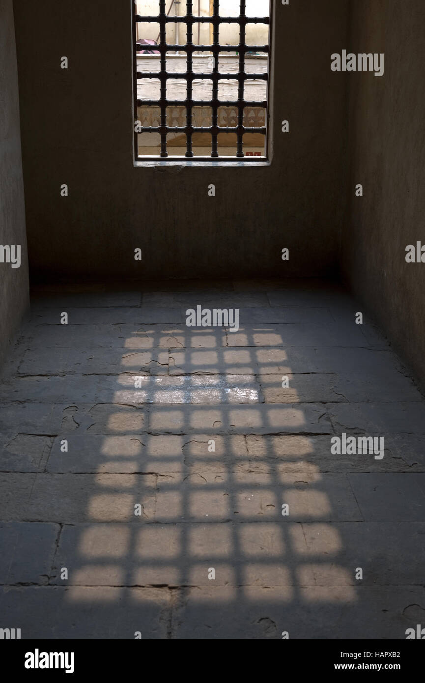 Sunlight through window grid Stock Photo - Alamy