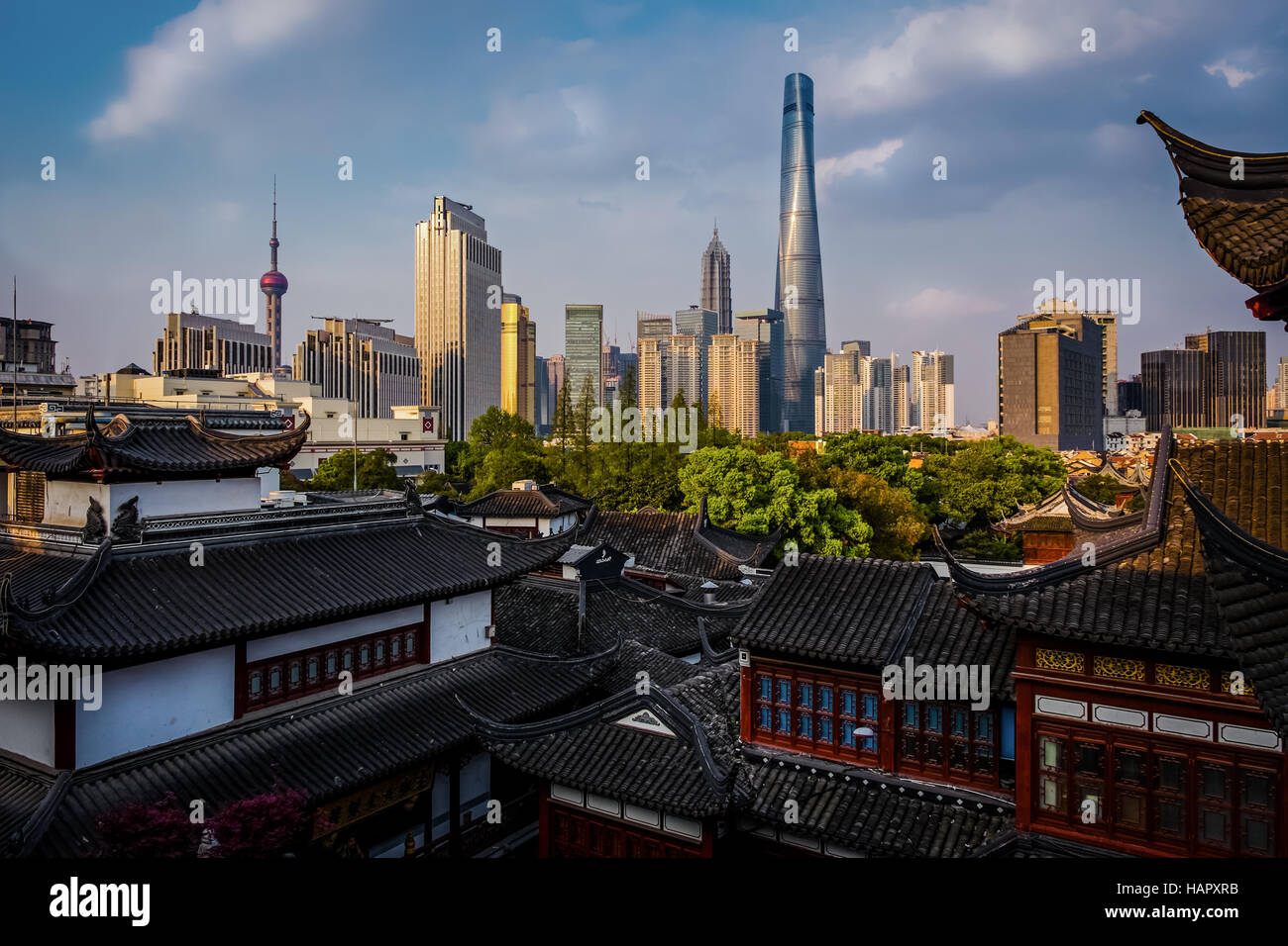 Shanghai City Skyline with traditional Chinese Rooftops Stock Photo - Alamy