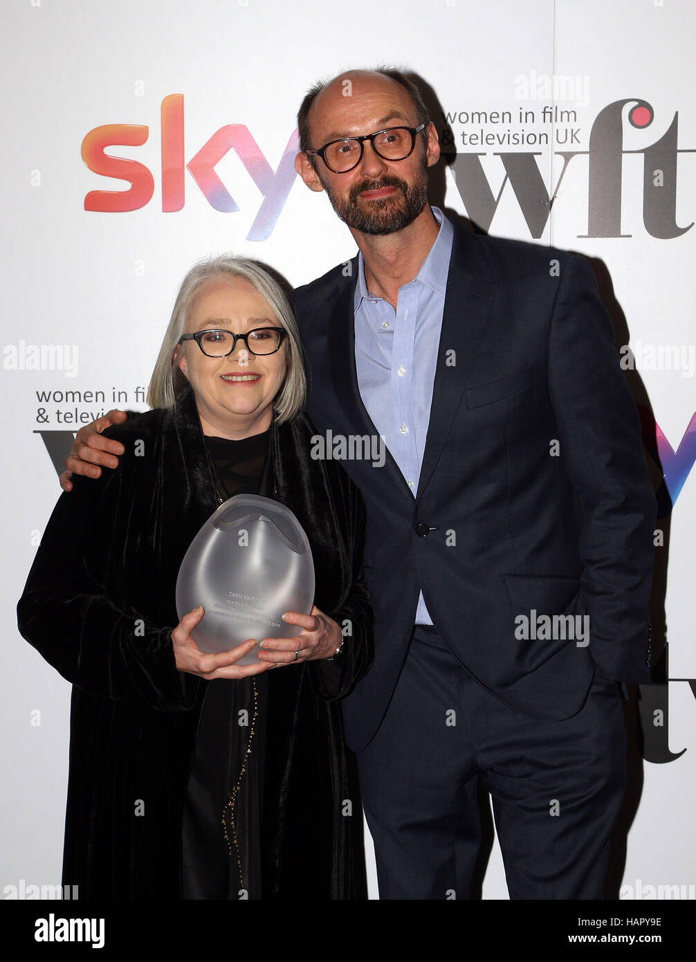 James Gay-Rees presented Tarn Harper (left) with the Film Finances ...