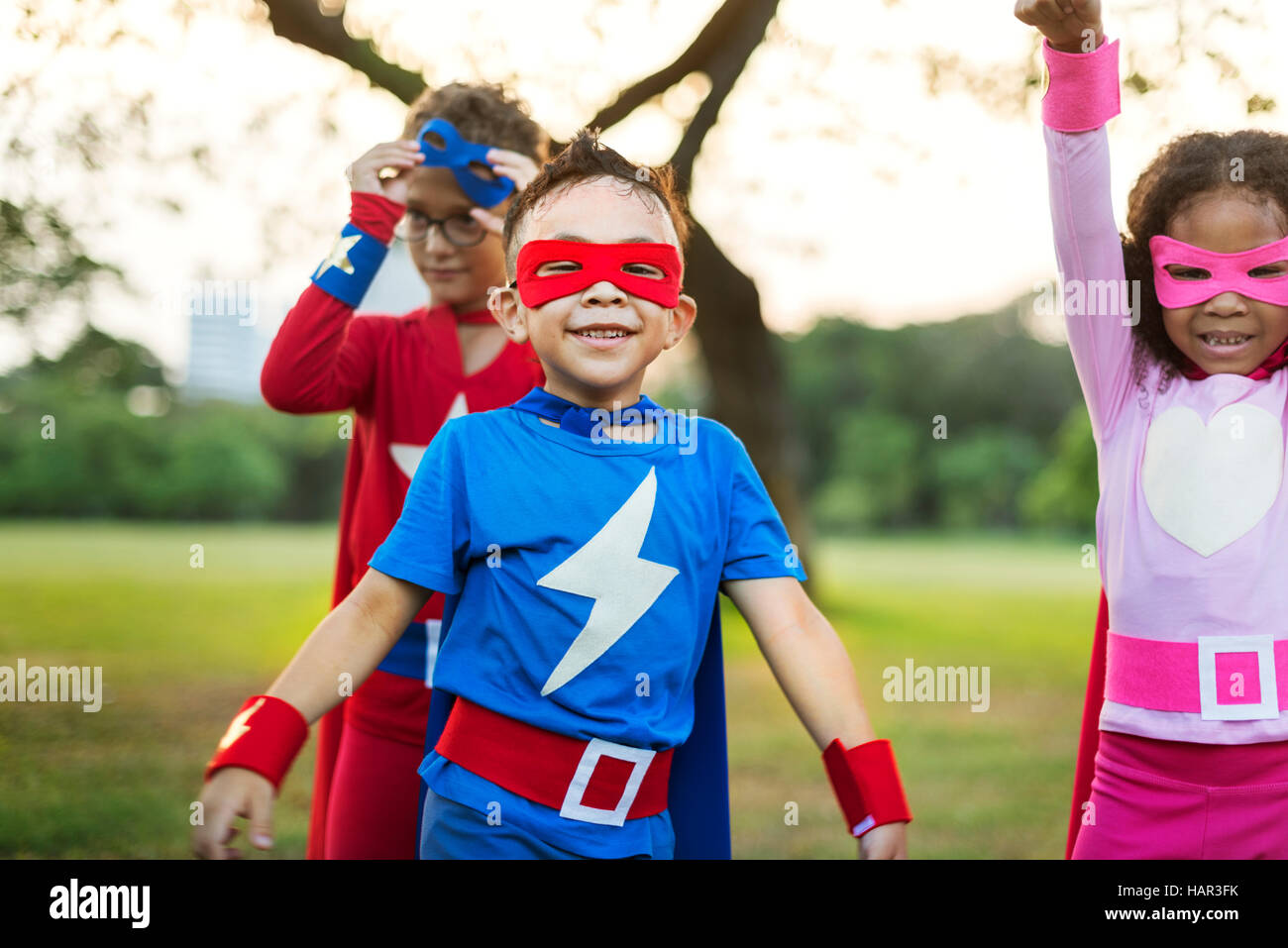Superheroes Cheerful Kids Expressing Positivity Concept Stock Photo - Alamy