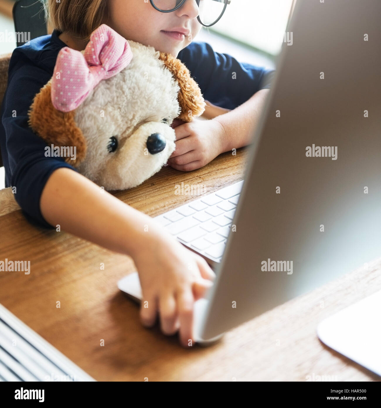 Little Girl Using Computer Concept Stock Photo - Alamy