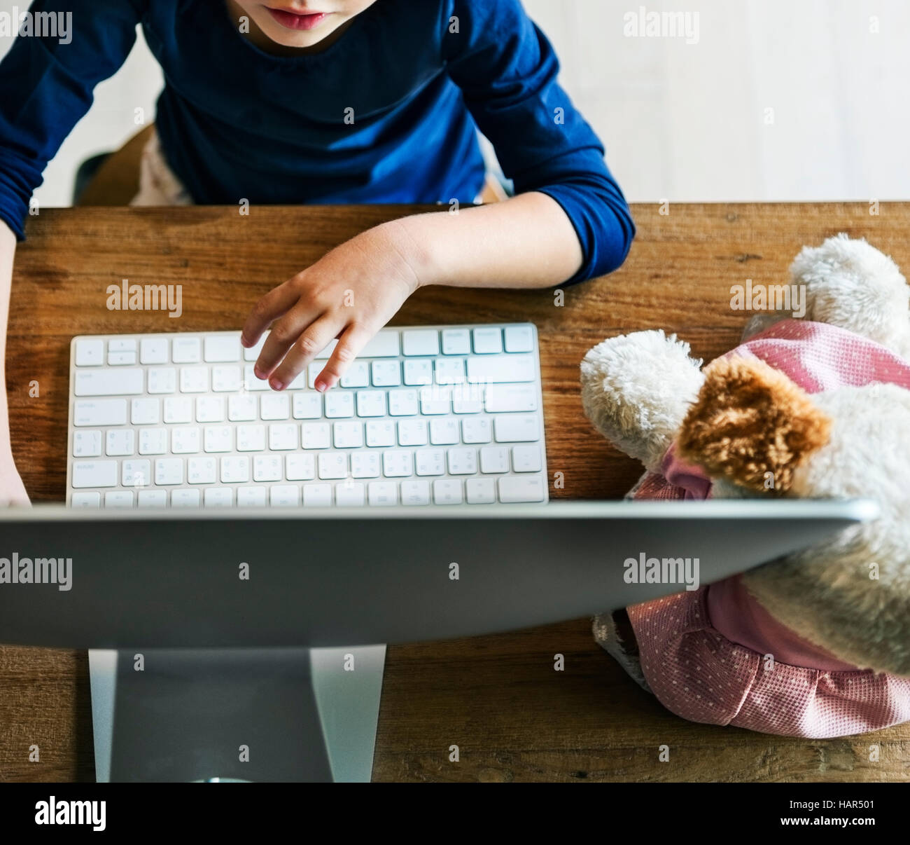 Little Girl Using Computer Concept Stock Photo - Alamy