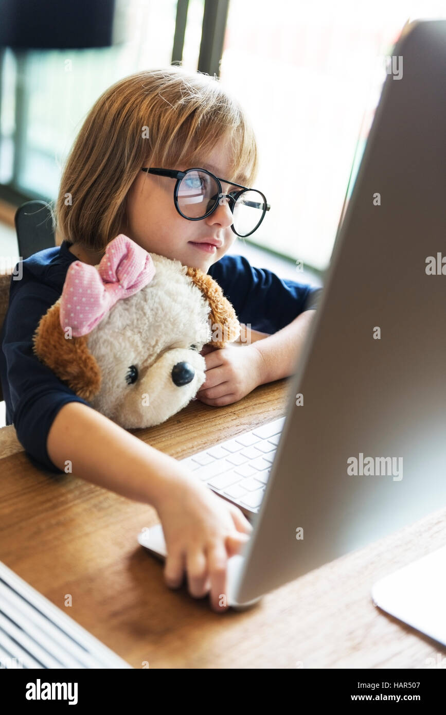 Little Girl Using Computer Concept Stock Photo - Alamy