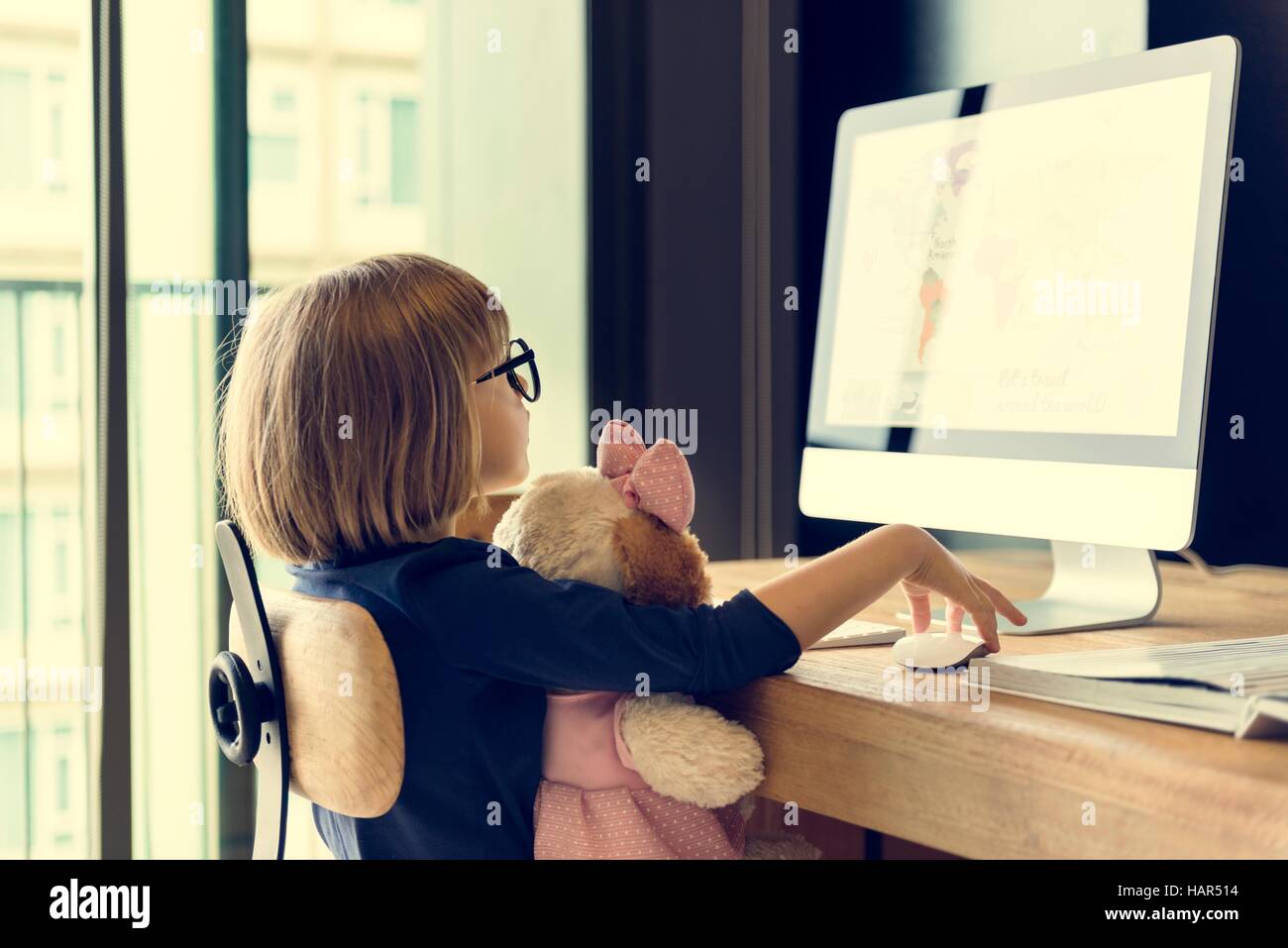 Little Girl Using Computer Concept Stock Photo - Alamy
