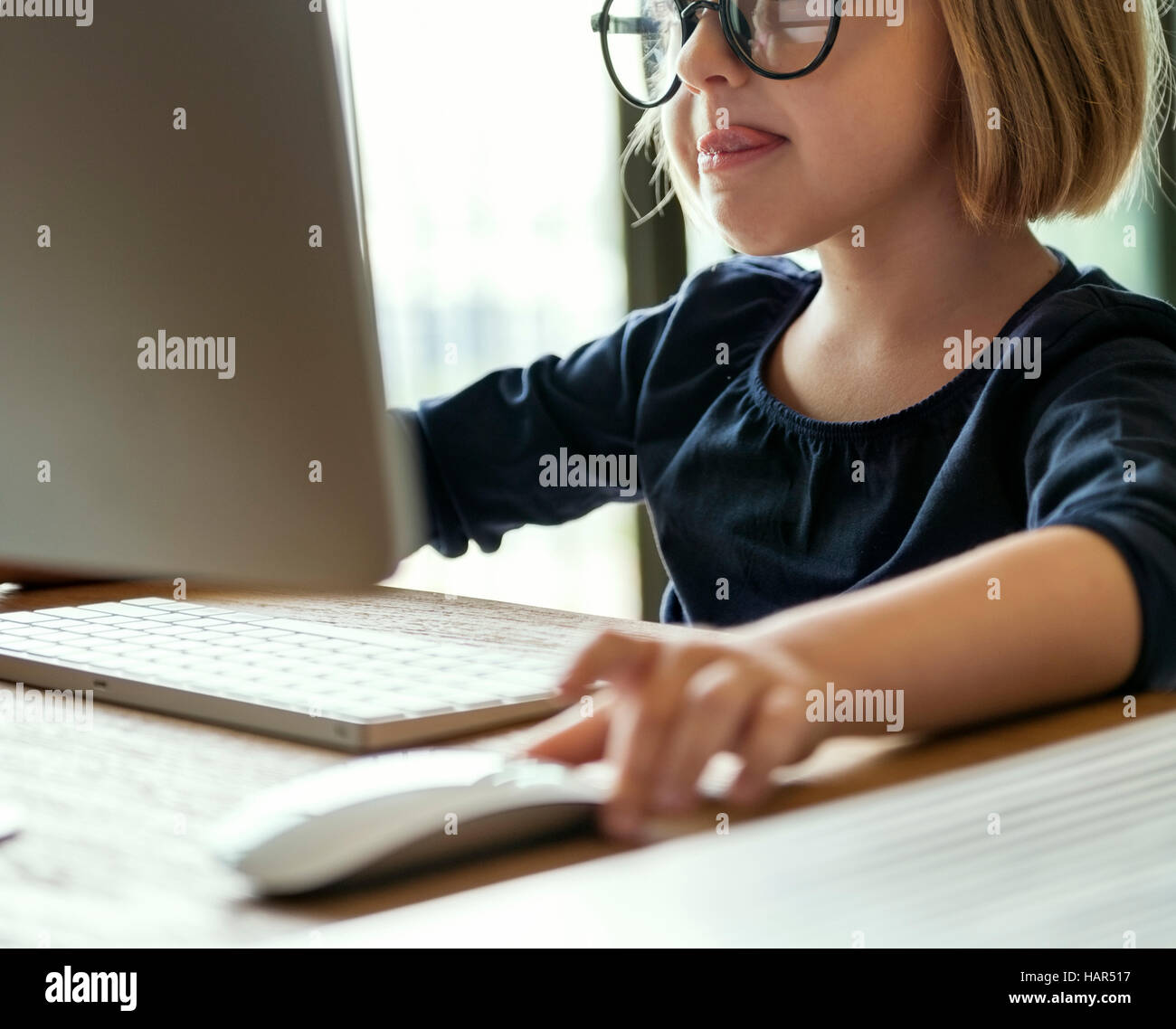 Little Girl Using Computer Concept Stock Photo - Alamy
