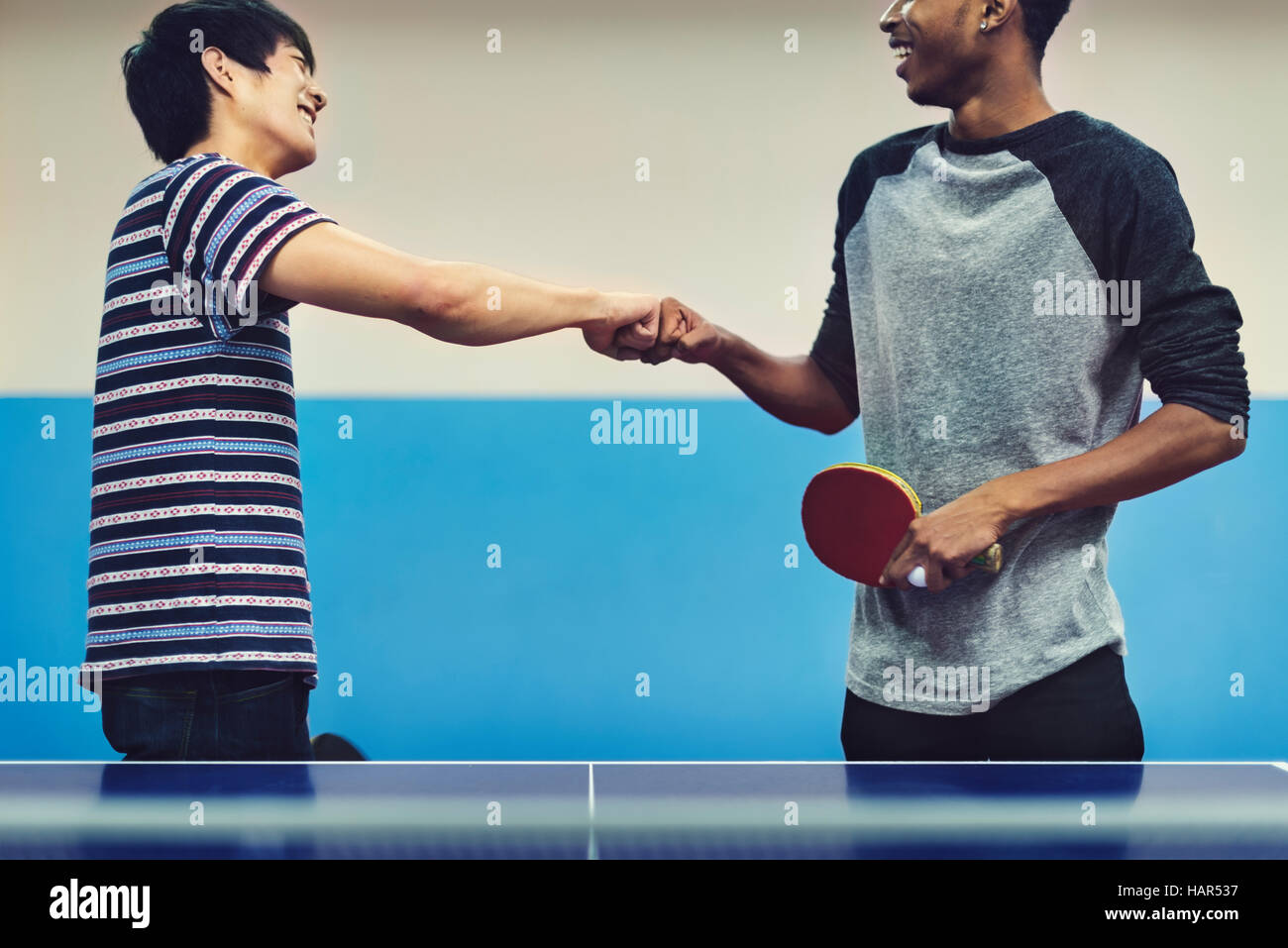 Diverse friends playing tennis hi-res stock photography and images - Alamy