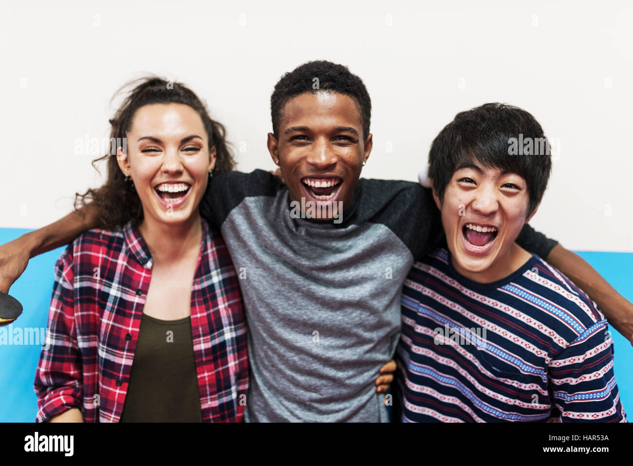 Diverse friends playing tennis hi-res stock photography and images - Alamy