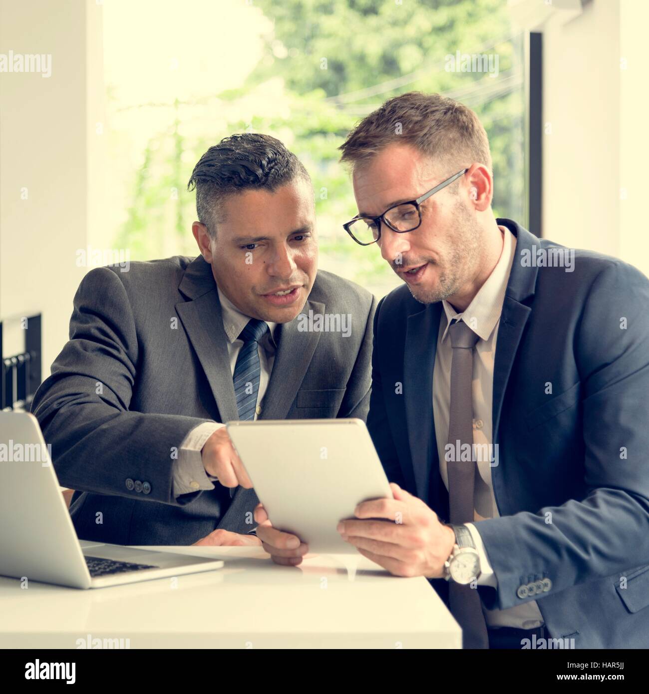 Business Men Meeting Tablet Concept Stock Photo - Alamy