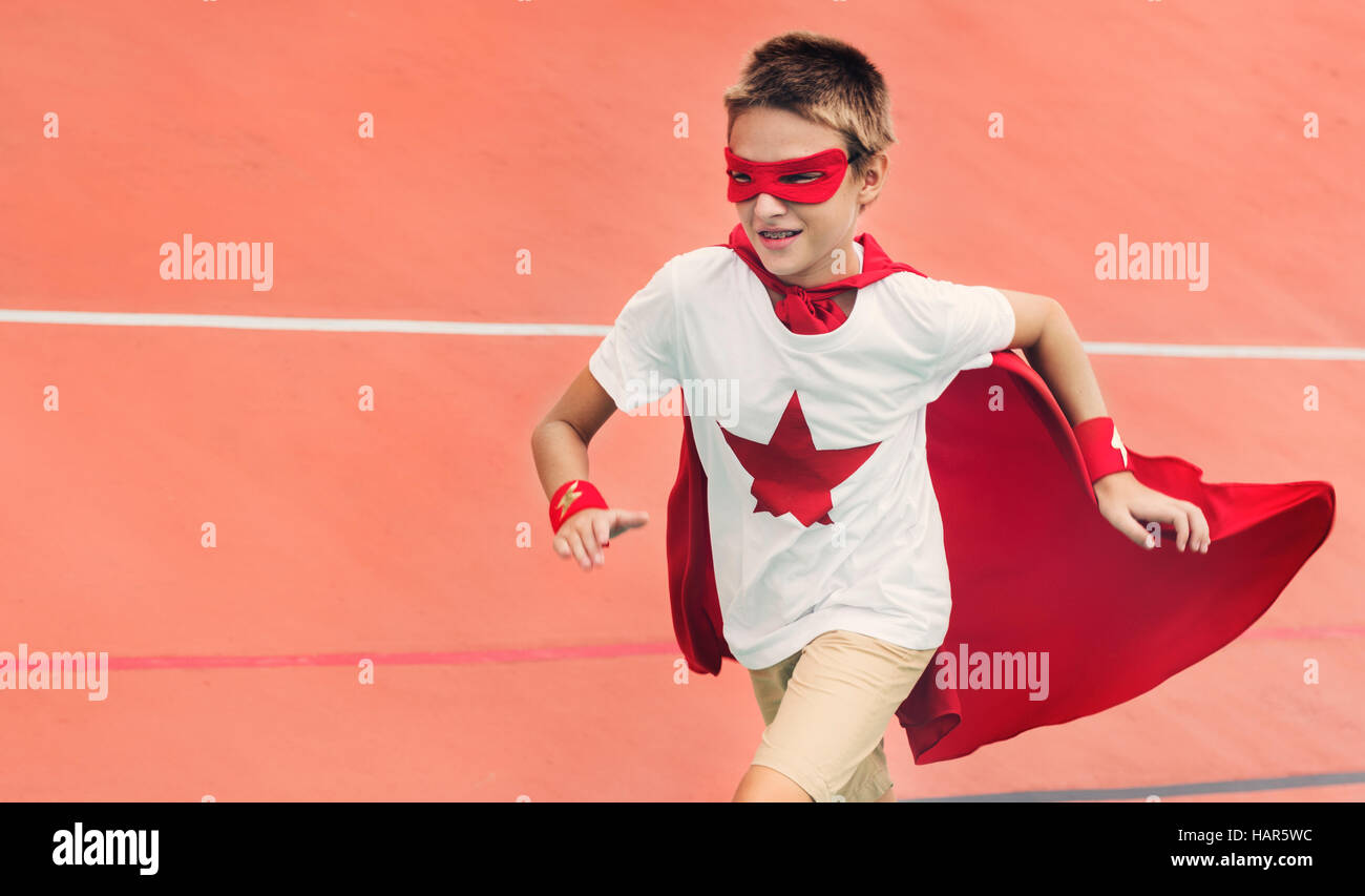 Superhero Boy Brave Running Activity Concept Stock Photo - Alamy