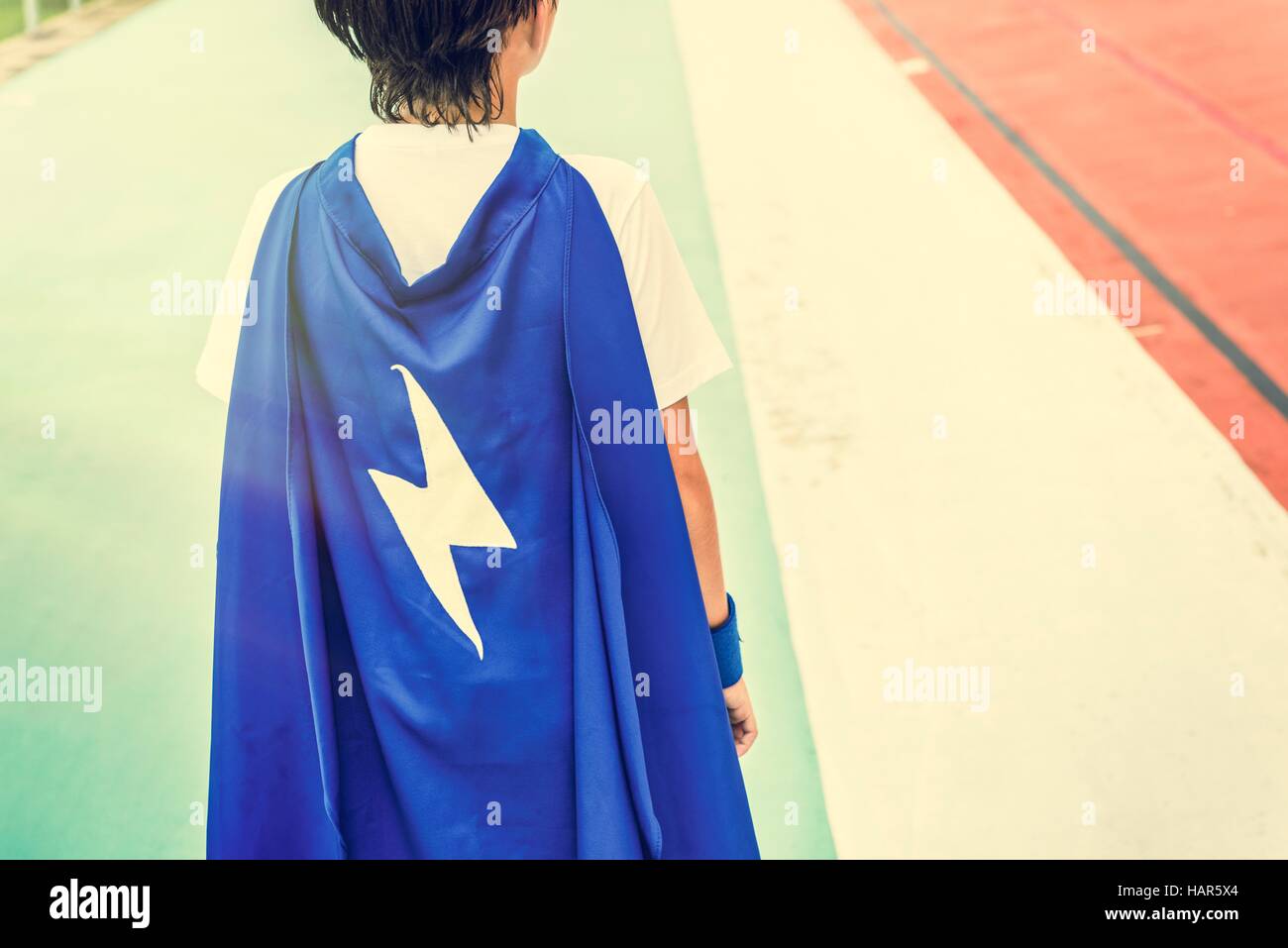 Superhero Boy Kid Custome Energy Concept Stock Photo - Alamy