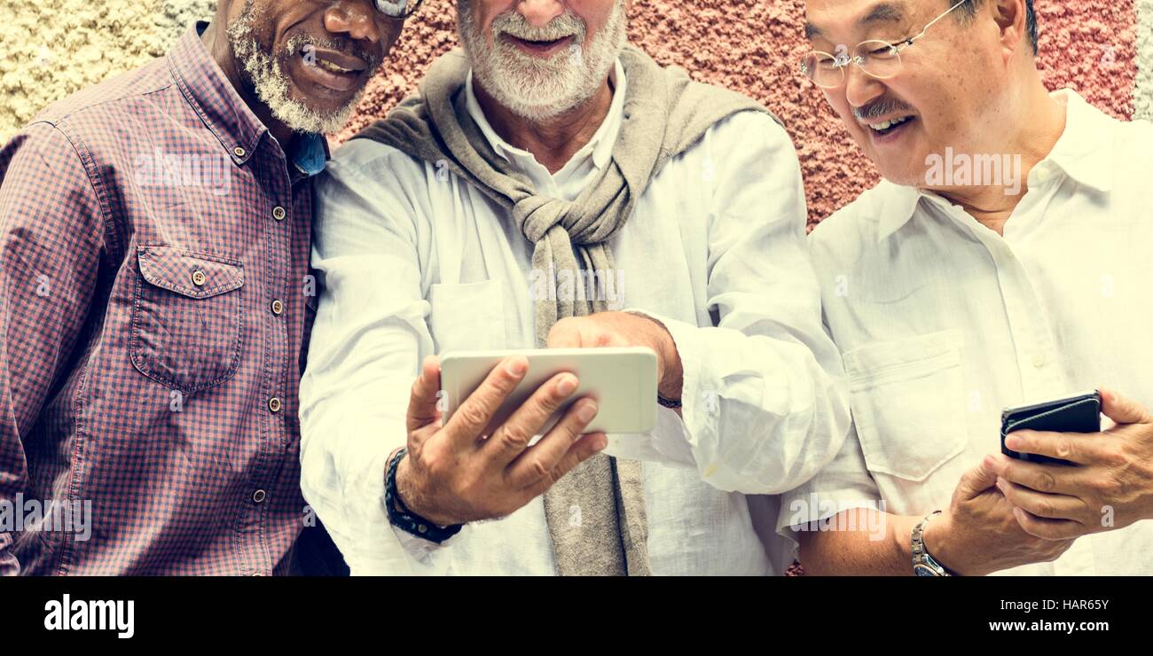 Group Of Senior Retirement Using Digital Devices Concept Stock Photo ...