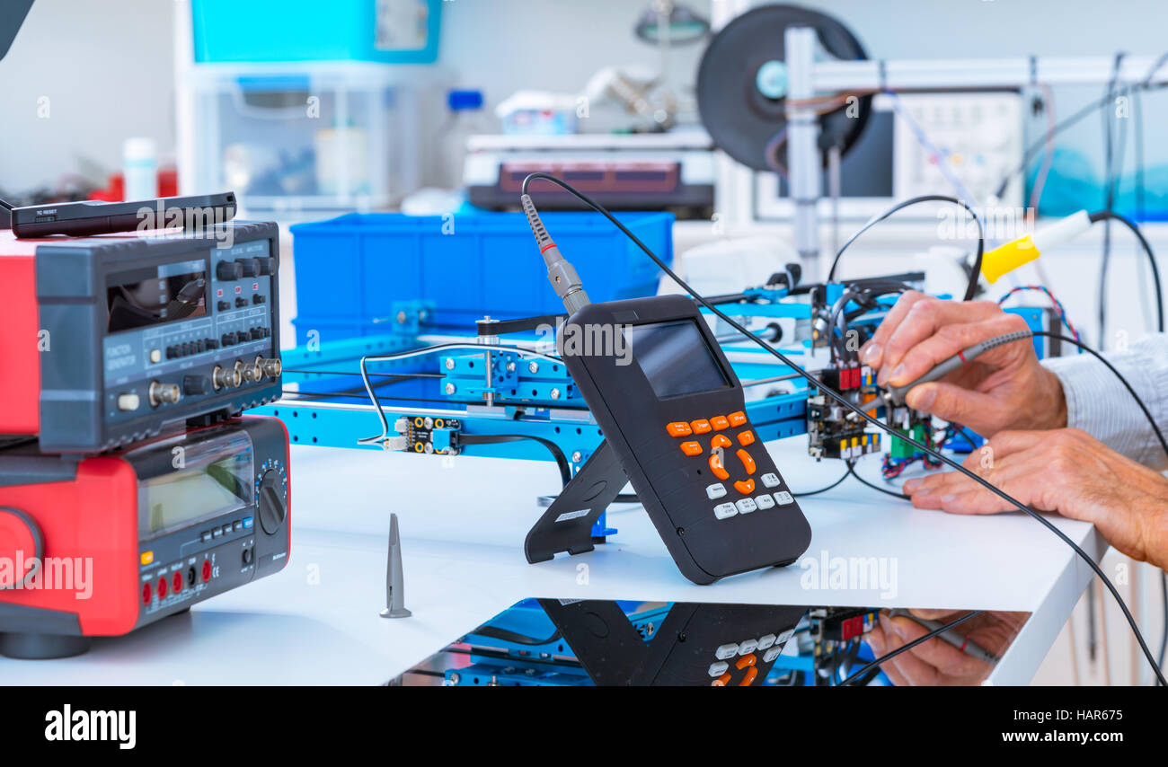 Hand adjusting circuit hi-res stock photography and images - Alamy