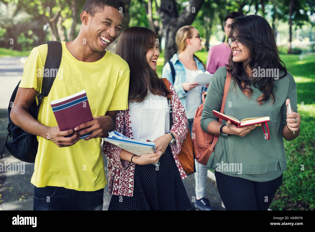 Diverse Young Students Book Outdoors Concept Stock Photo - Alamy Diverse Young Students Book Outdoors Concept Stock Photo - Alamy